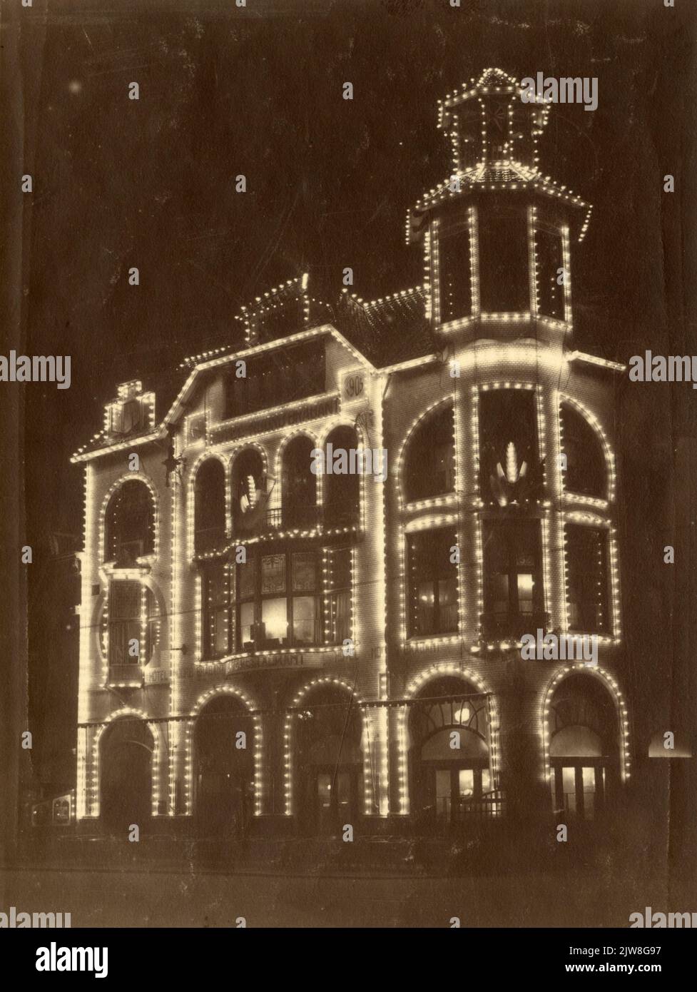 View of the illuminated Hotel-Café-Restaurant Noord-Brabant (Vredenburg ...