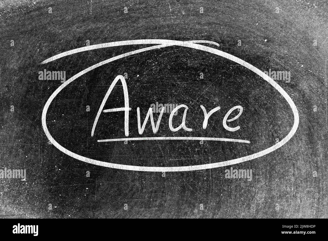 White chalk hand writing in word aware on blackboard background Stock ...