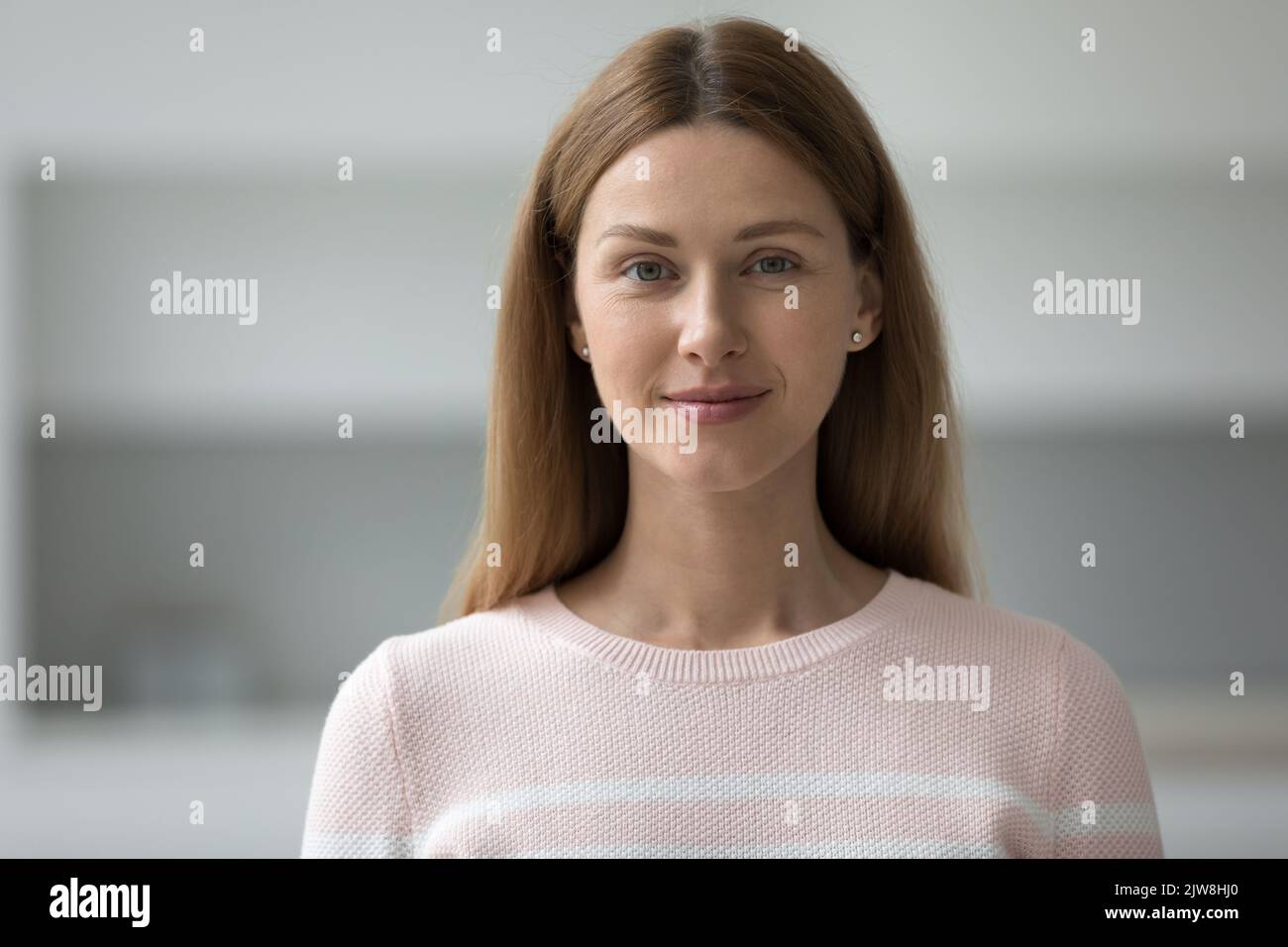 Positive pretty adult female model head shot portrait Stock Photo - Alamy