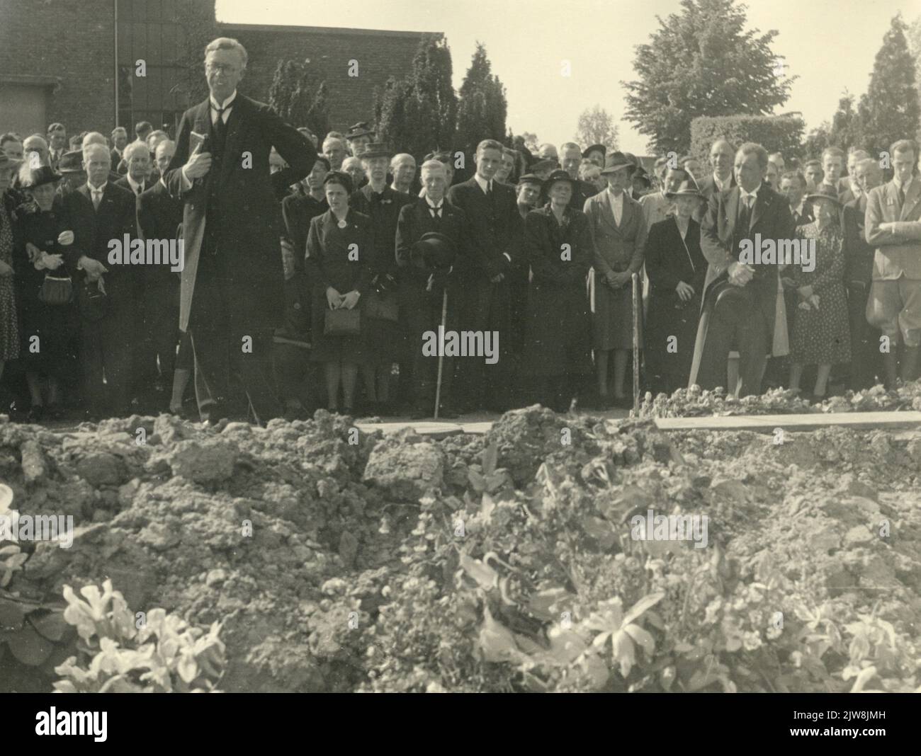 Image of pastor Dr. G.W. Oberman who speaks a word during the funeral ...