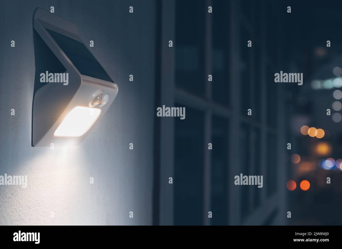 Small solar powered led light with motion sensor Stock Photo - Alamy