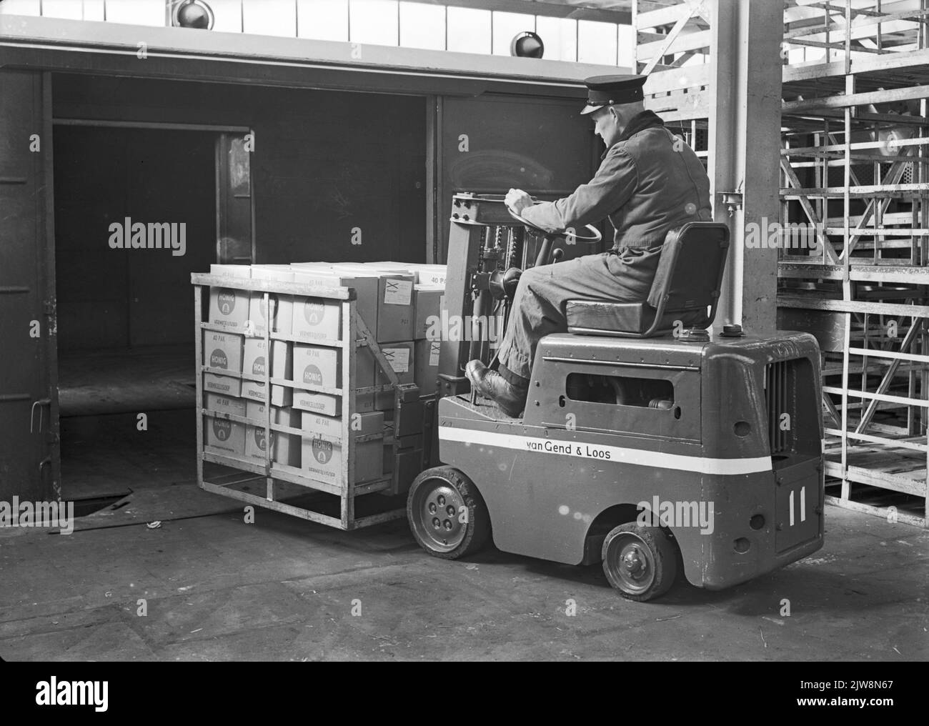 Image of loading a goods wagon using a forklift truck in the shed of ...