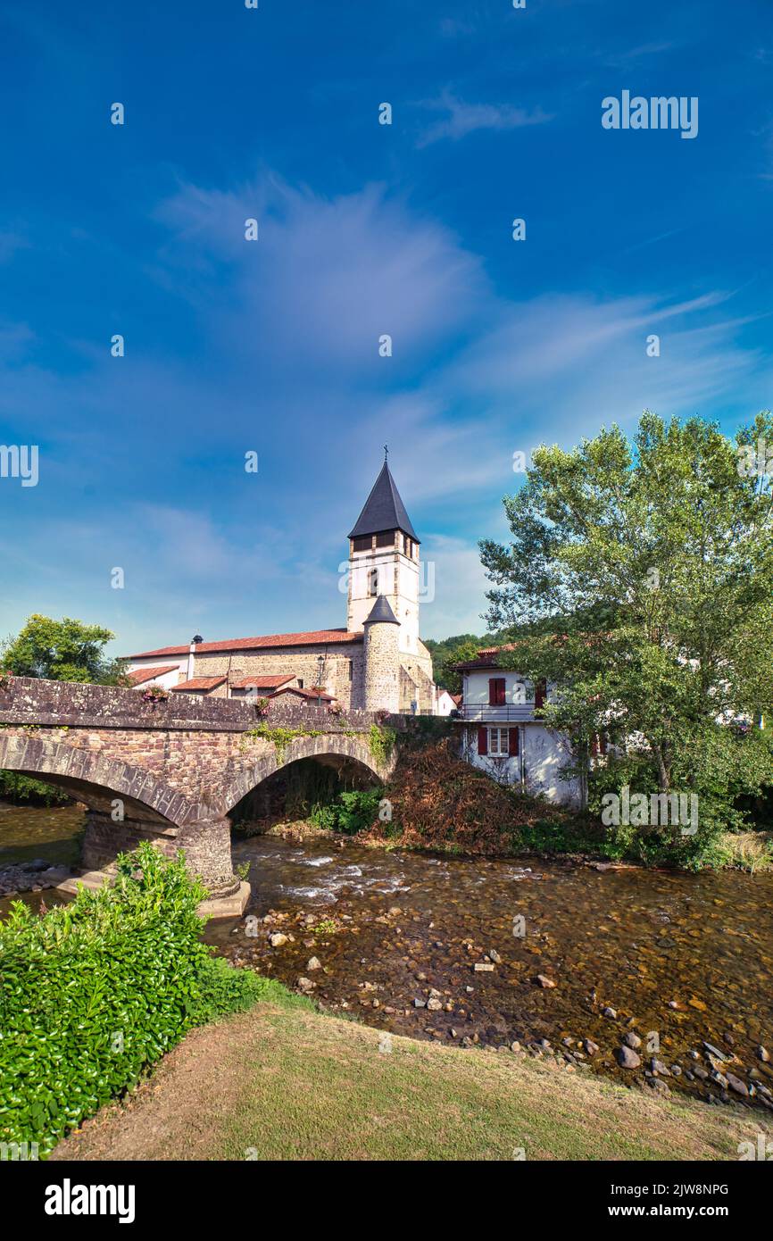 A vertical shot of a beautiful bridge above the water in Saint-Etienne ...
