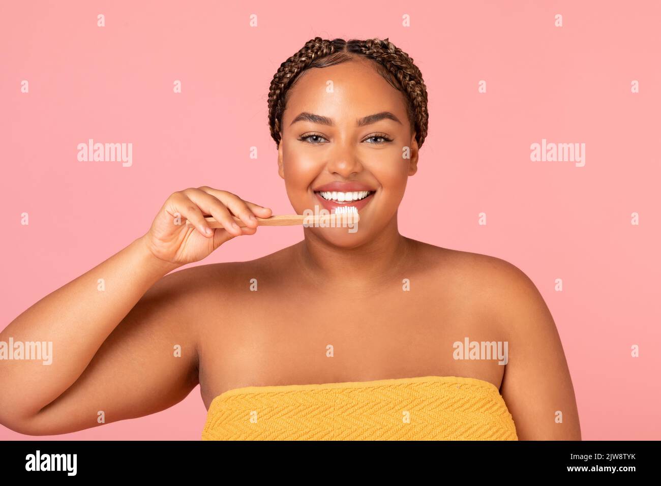 Black Woman Brushing Teeth With Toothbrush Posing On Pink Background ...