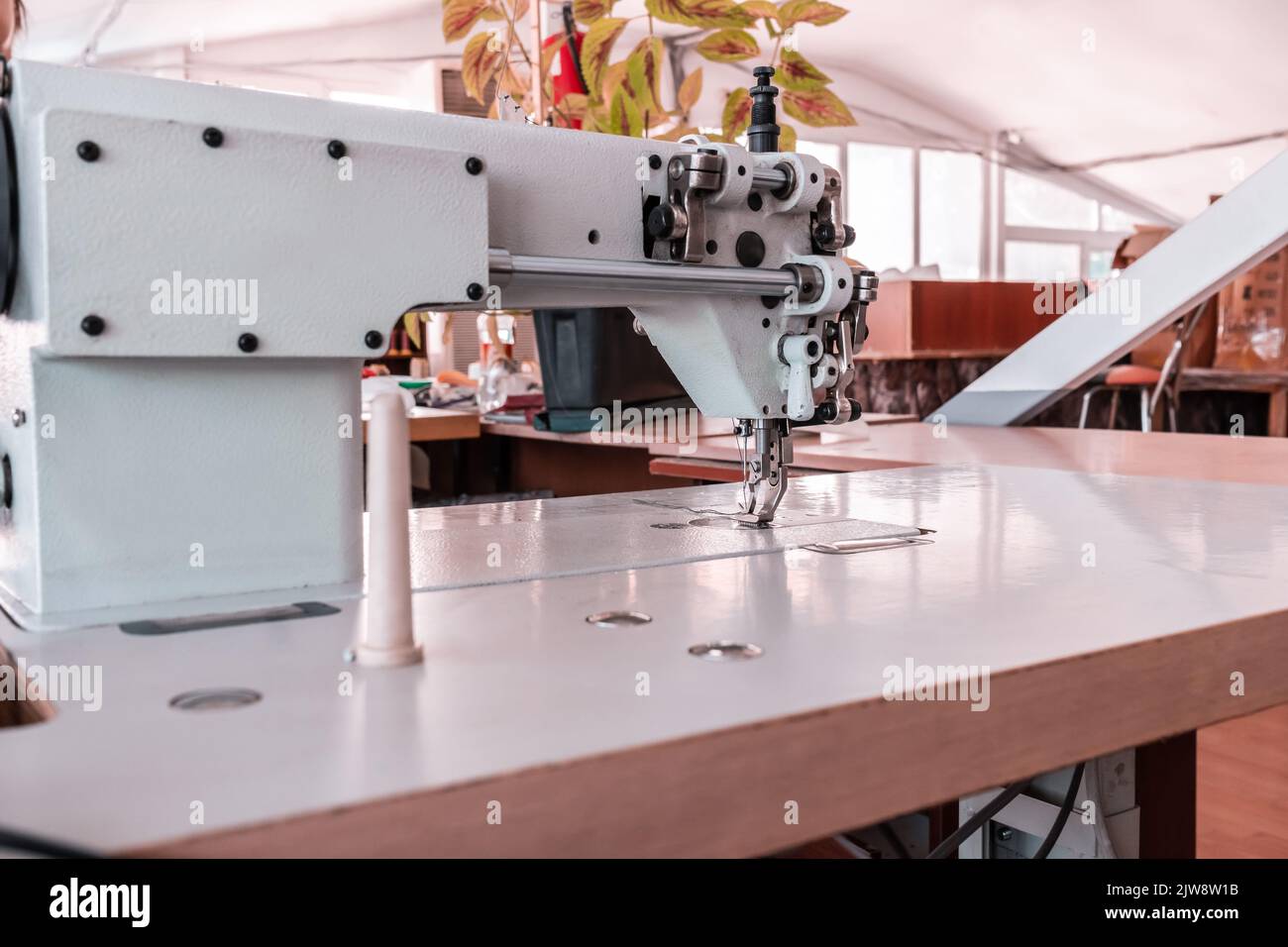 Sewing machine in the workshop Stock Photo - Alamy