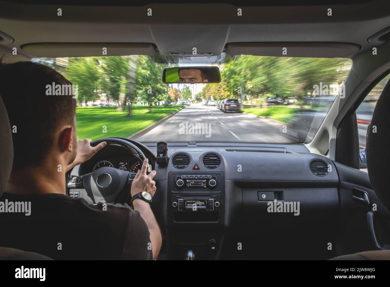 Hands on the wheel when driving at high speed from inside the car Stock ...