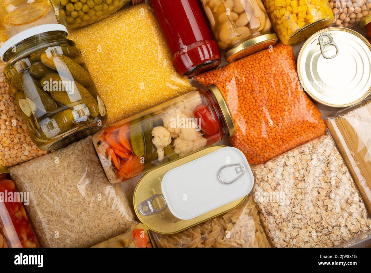 Emergency survival groceries on kitchen table closeup flat lay Stock ...