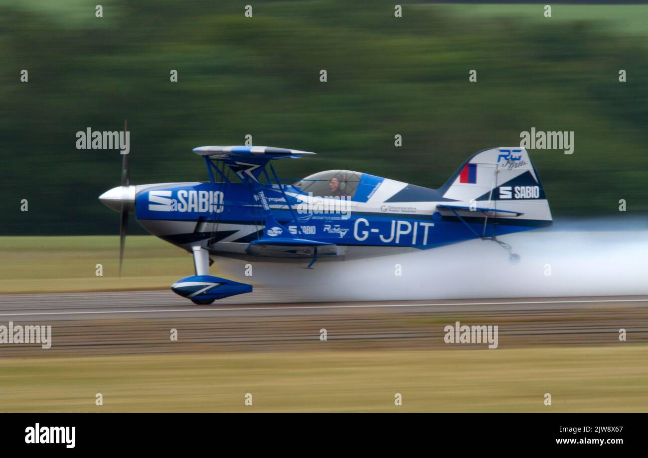 Jet Pitts - Muscle Biplane, G-JPIT, taking off with smoke for an ...