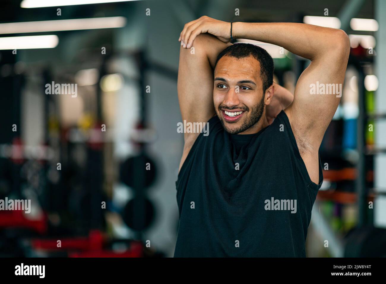 Male athlete stretching arms during hi-res stock photography and images ...
