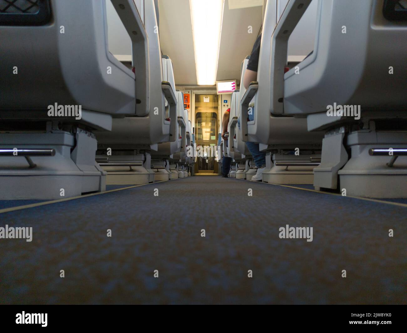 Normal class train carriage corridor. Ground view Stock Photo - Alamy