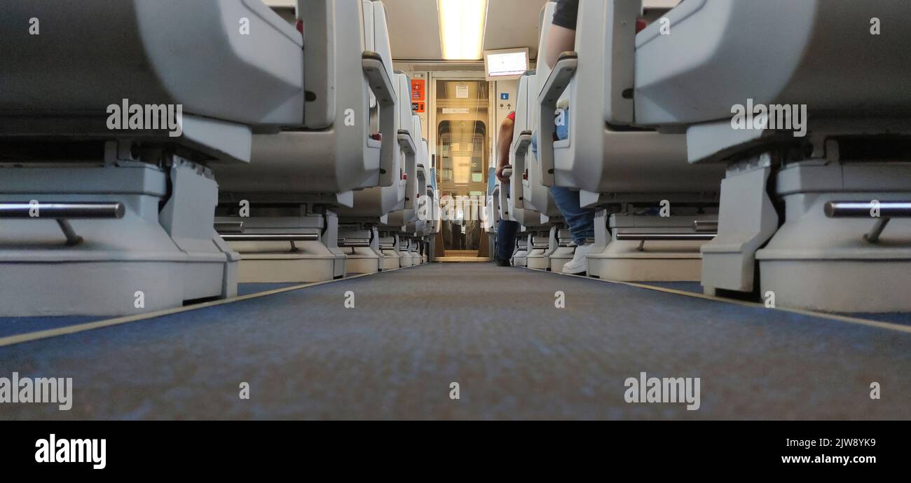 Normal class train carriage corridor. Ground view Stock Photo - Alamy