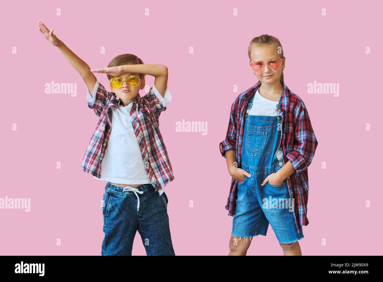 Cute stylish kids in color sunglasses looking at camera a Stock Photo ...