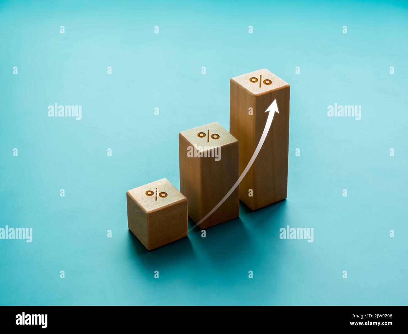 Shining rise up arrow on wooden cube blocks, bar graph chart steps with percentage icons on blue ...