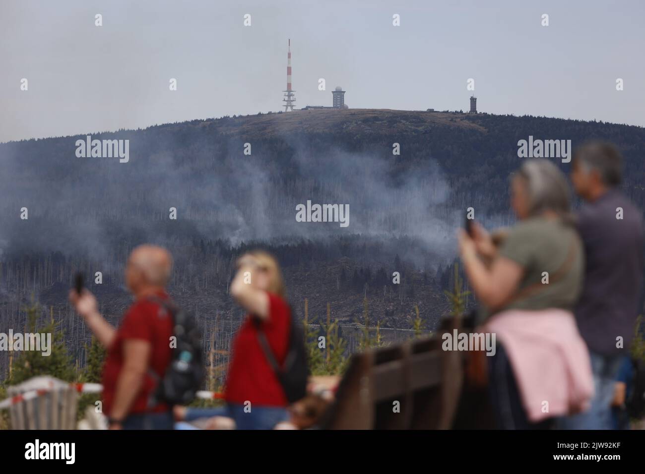 Schierke, Germany. 04th Sep, 2022. Smoke rises from the burnt trees ...