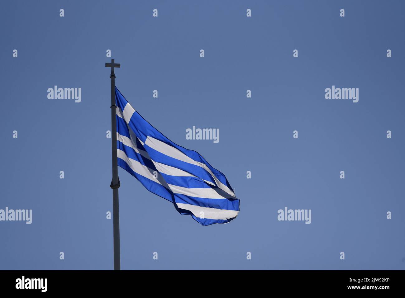 Waving blue and white Greek flag national symbol and ensign on the ...