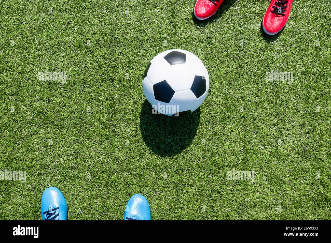 Soccer football background. Soccer ball and two players standing on ...
