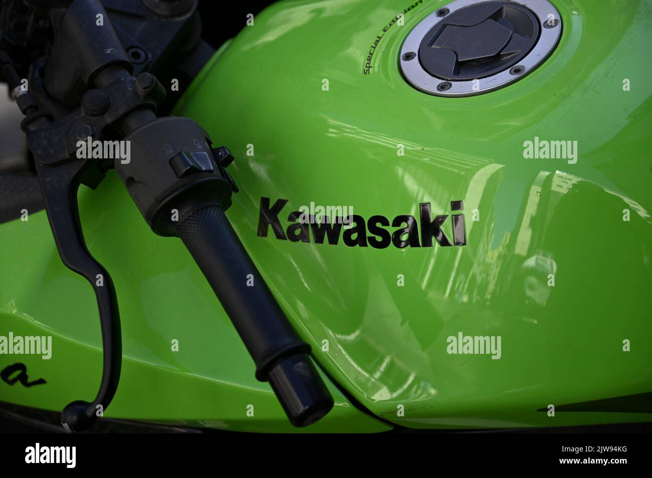 Lime green Kawasaki Ninja fuel tank closeup in downtown Athens, Greece ...