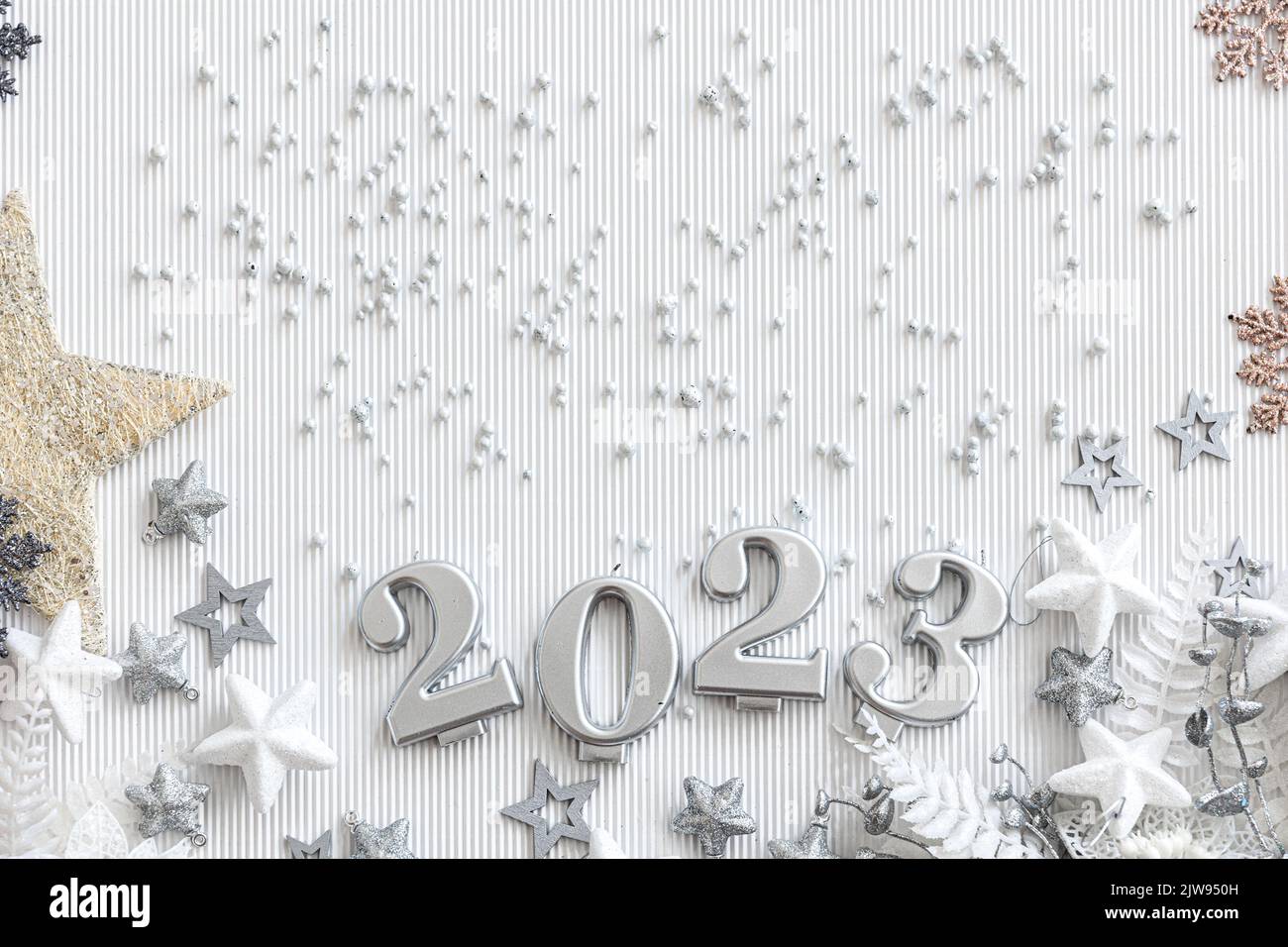 Christmas background with numbers 2023 and decor on a white background ...