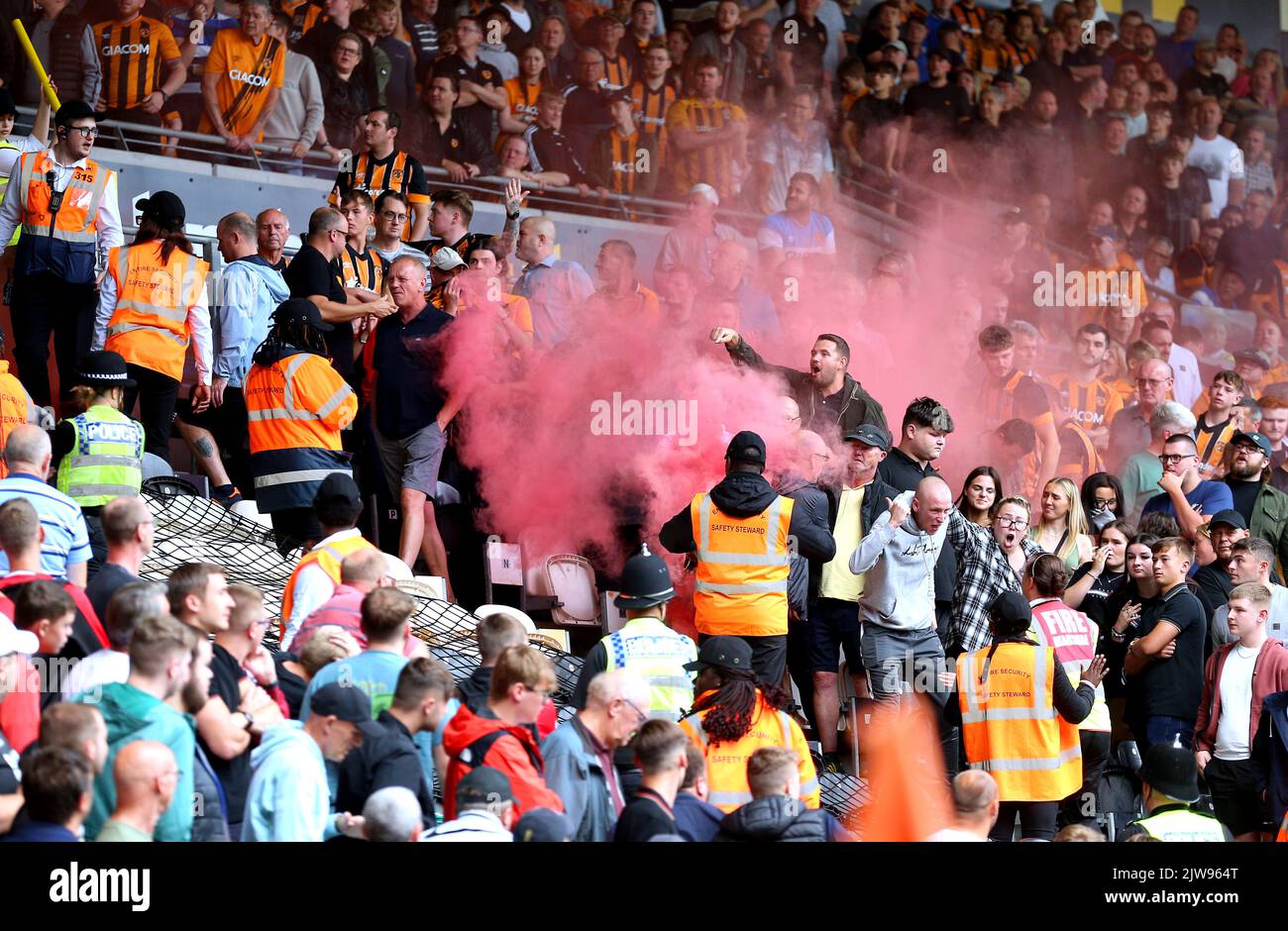 A flare is set off in the stands hi-res stock photography and images ...