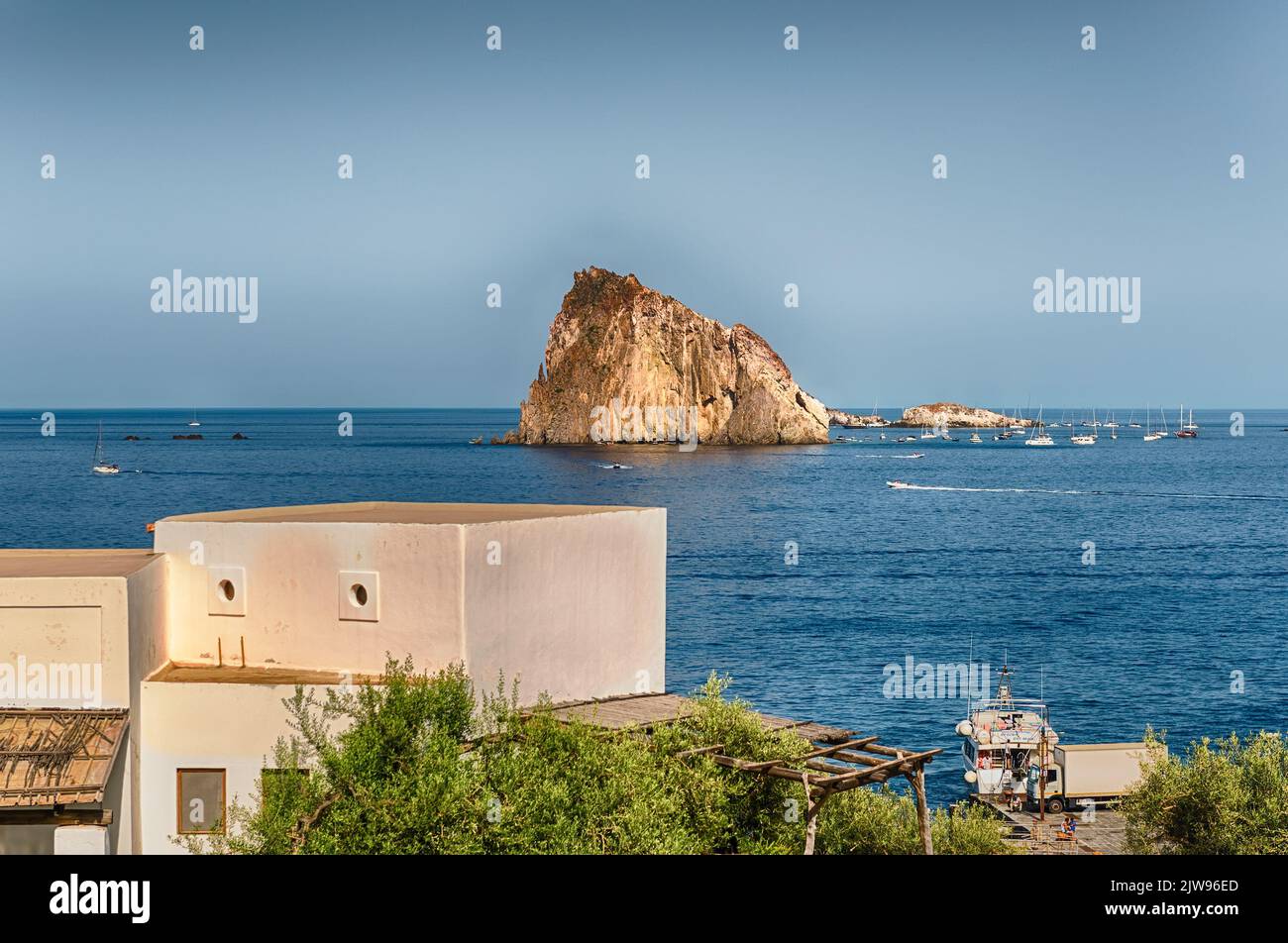 View of Dattilo's rock from the beach of Panarea, the smallest of the ...