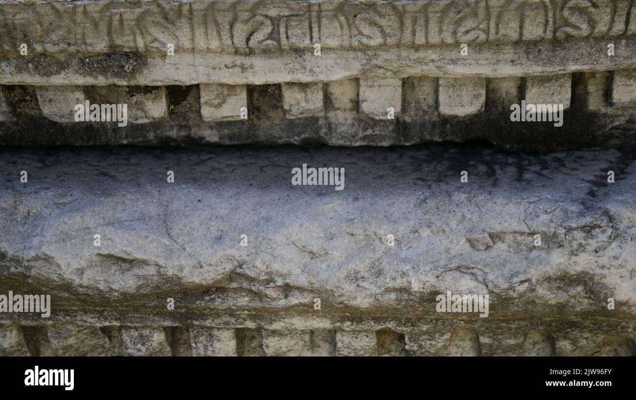 Ancient marble sculpted inscription from the lower epistyle of Stoa ...