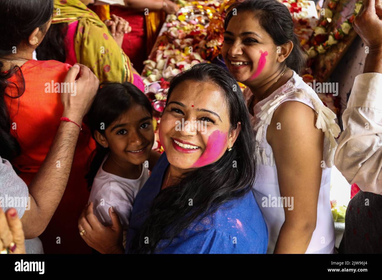Devotees smile during the Ganesh Chaturthi festival in Nakuru. Devotees ...