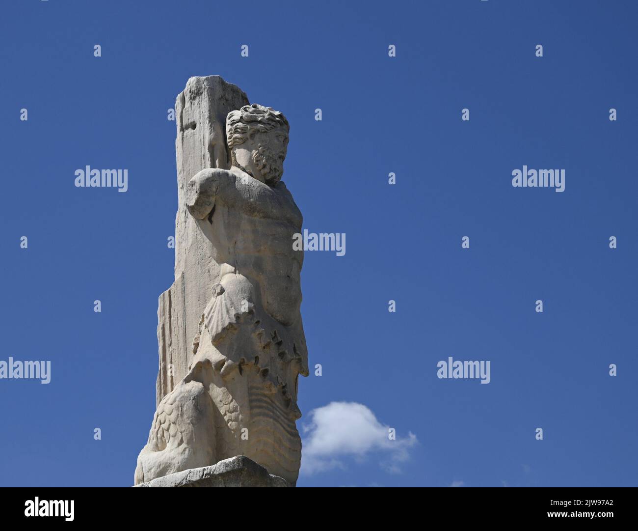 Statue of a triton-shaped pillar along the former facade of the Odeon ...