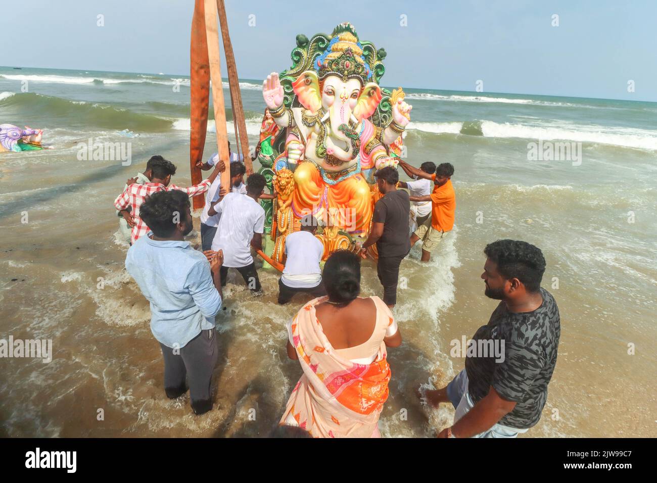 Chennai, India, 4th Sep 2022: Devotees look on as an idol of Hindu god ...