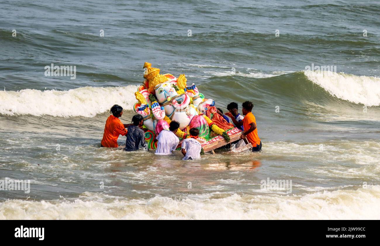 Chennai, India, 4th Sep 2022: wave hits the people who are doing the ...