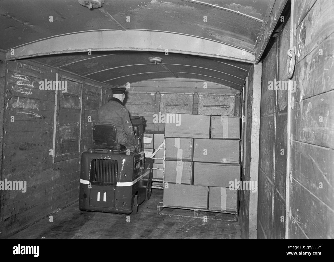 Image of loading a freight wagon with a forklift truck in the shed of ...