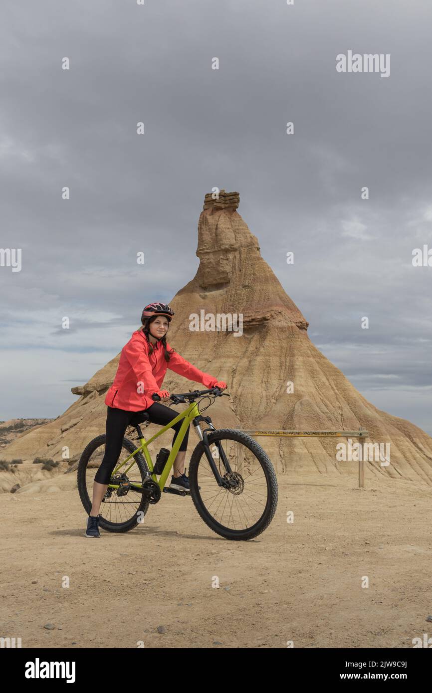 Young woman mountain bike cyclist next to Castildetierra Mountain in ...