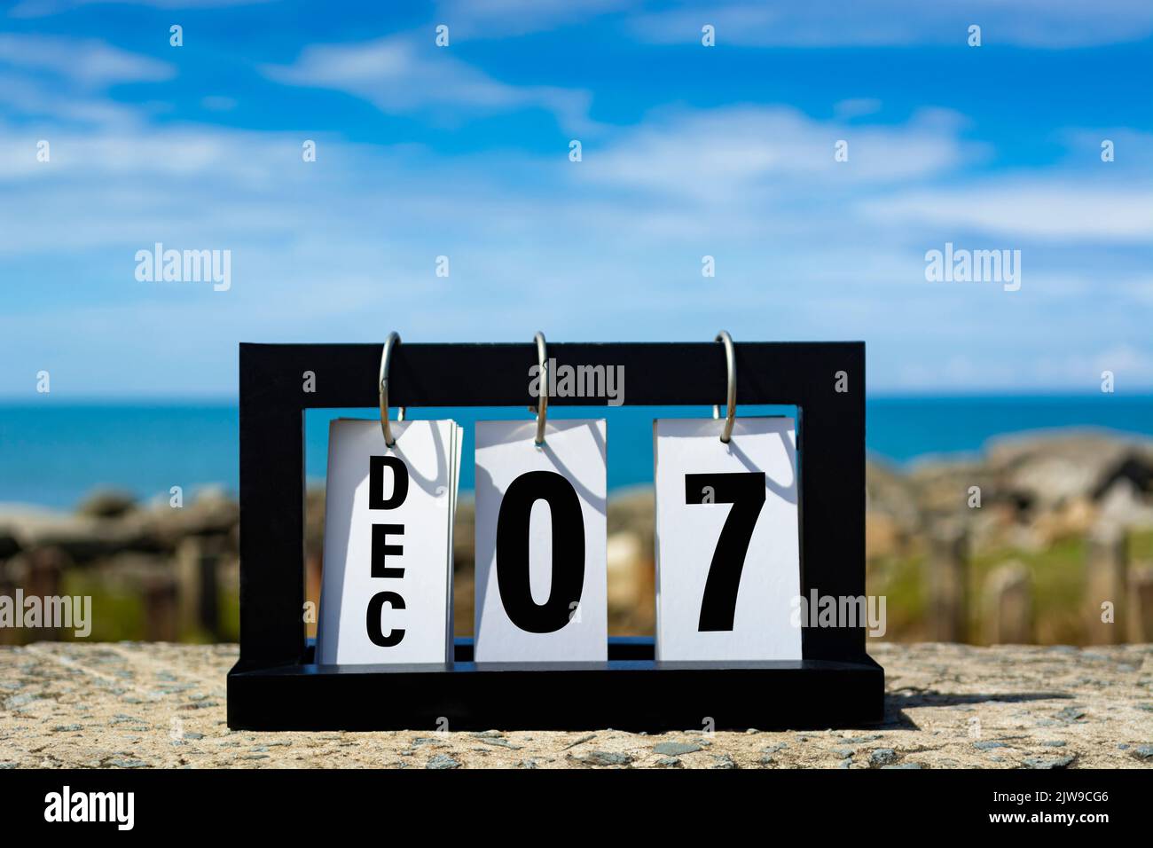 Dec 07 calendar date text on wooden frame with blurred background of ...