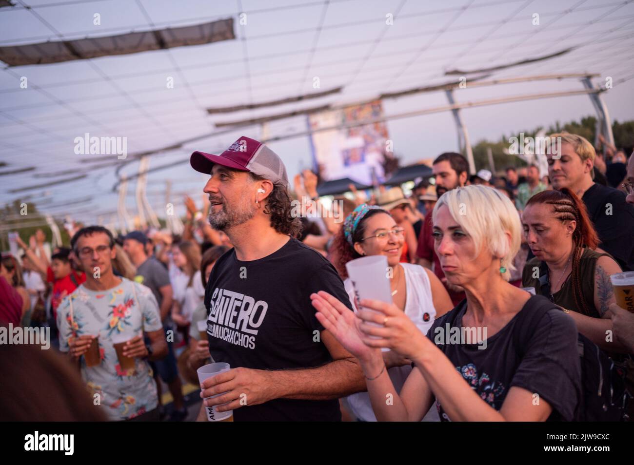 Crowd listens and dances with Mexican band Instituto Mexicano del ...