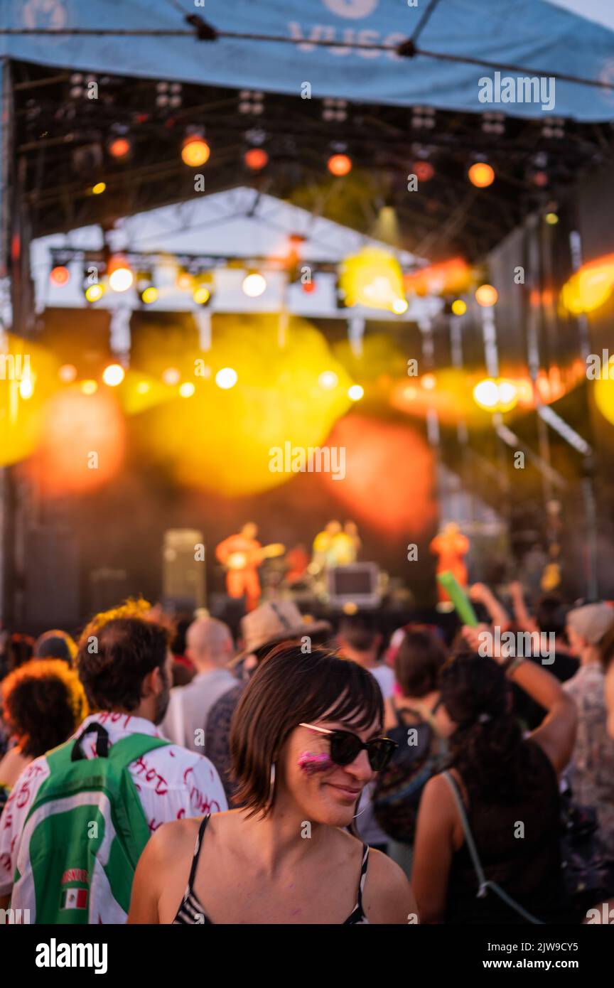Crowd listens and dances with Mexican band Instituto Mexicano del ...