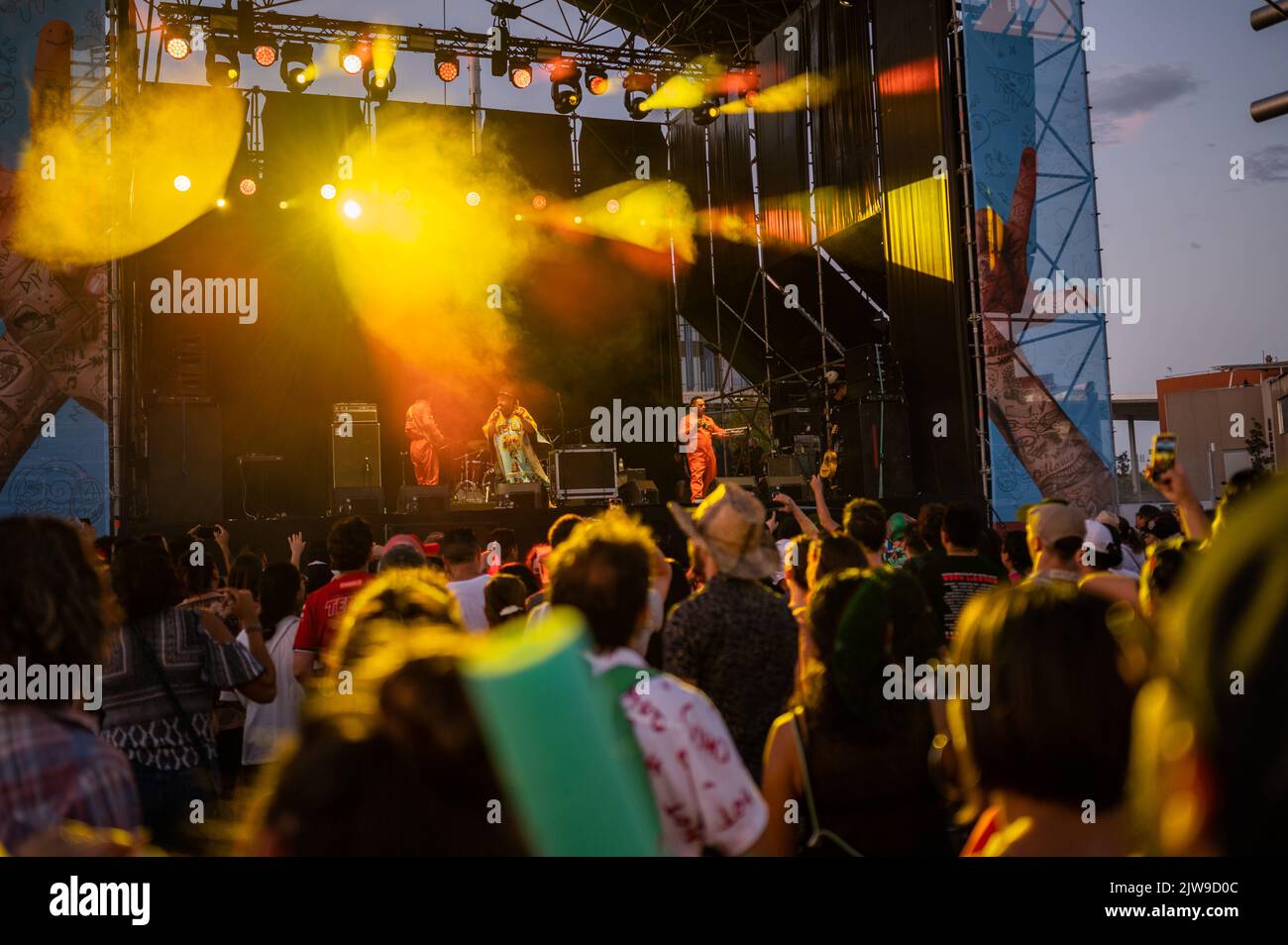 Crowd listens and dances with Mexican band Instituto Mexicano del ...