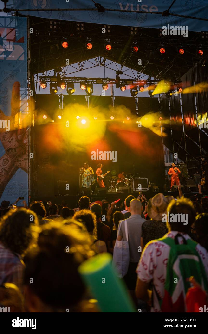 Crowd listens and dances with Mexican band Instituto Mexicano del ...