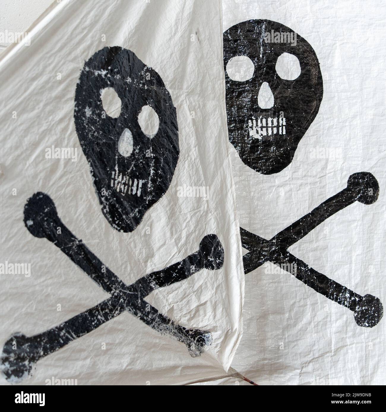 Hand painted skull and crossbones symbols on a toy boat Stock Photo - Alamy