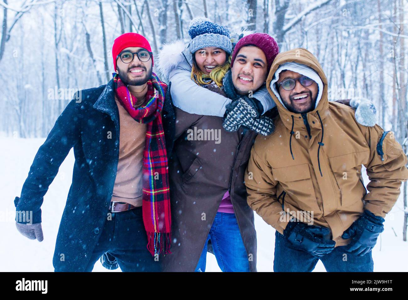 Outdoor lifestyle portrait of four best friends, smiling and having fun ...