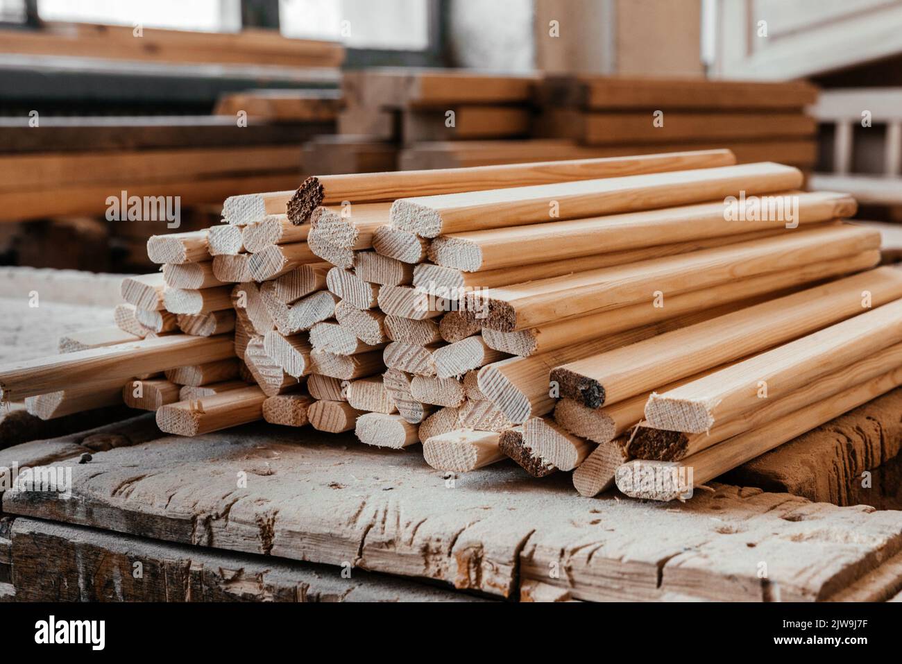 Woodworking shop. Wood processing. Pine board. Wooden billets. Use of ...