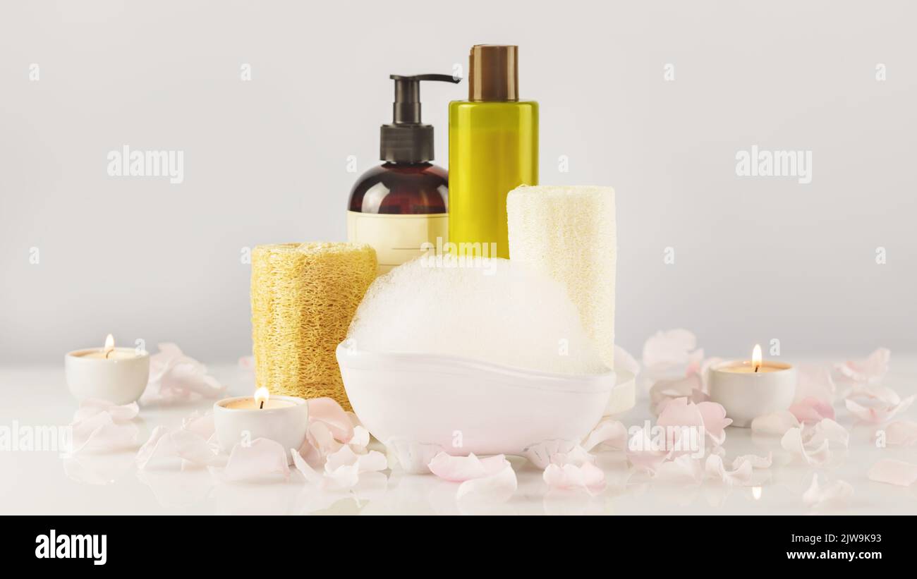 Spa relax composition with bath beauty products, cosmetics and candles ...