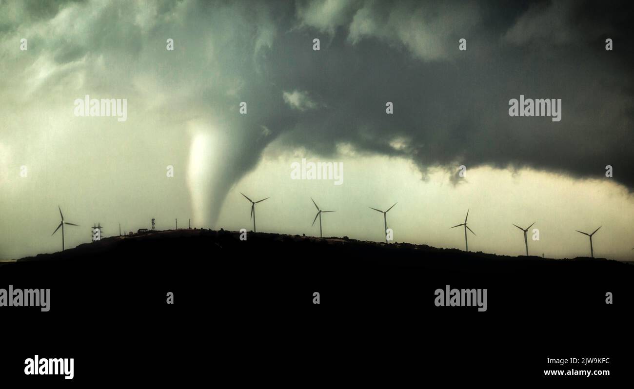 Wind energy. Concept. Hurricane over windmills Stock Photo - Alamy