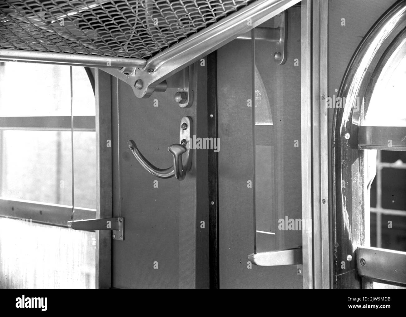 Image of the draft windows and a clothing hook in an electric train set ...