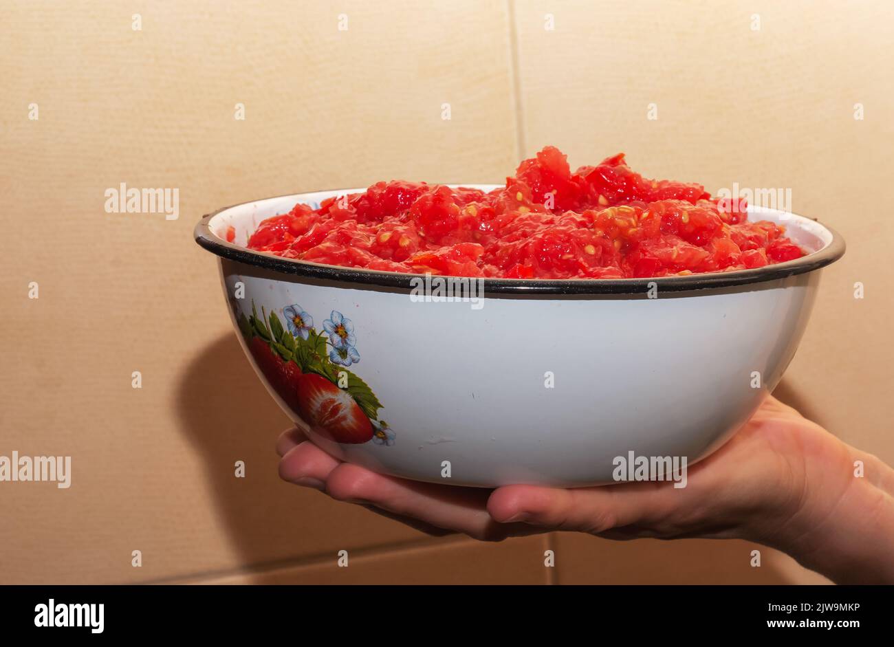 Freshly pressed tomatoes. The remains of tomatoes after processing in a ...