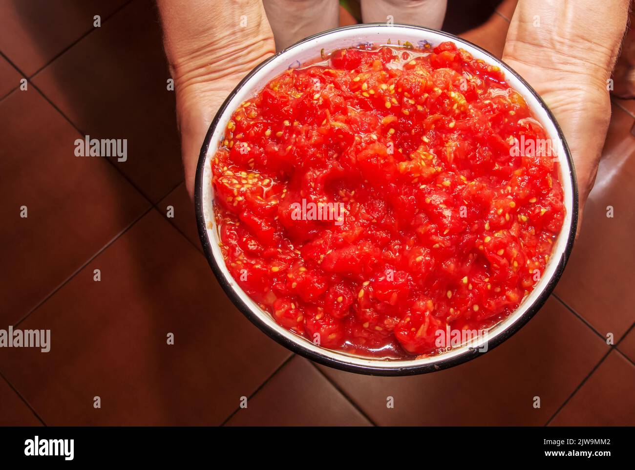 Freshly pressed tomatoes. The remains of tomatoes after processing in a ...