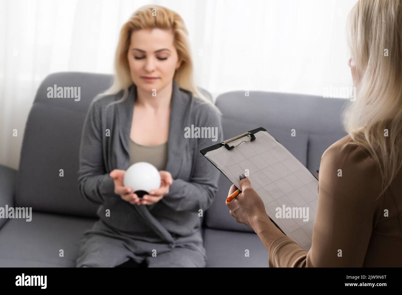 Professional psychologist conducting a consultation Stock Photo - Alamy