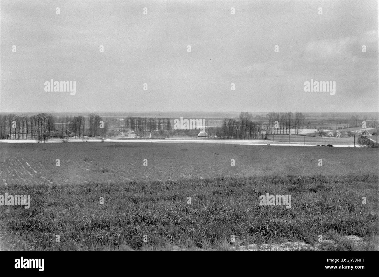 Image of the rolling meadow landscape with some farms in the ...