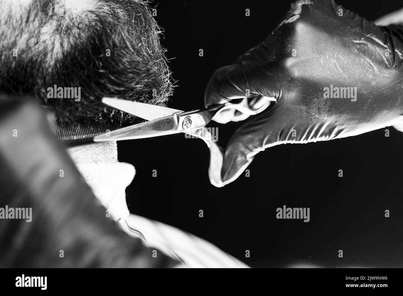 Man grooming beard scissors Black and White Stock Photos & Images - Alamy