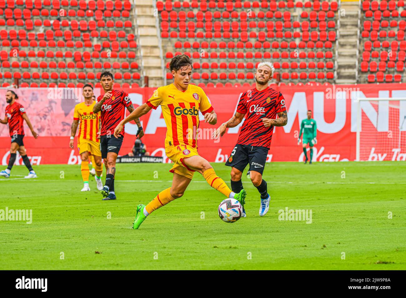 MALLORCA, SPAIN - SEPTEMBER 3: Rodrigo Riquelme of Girona CF between ...