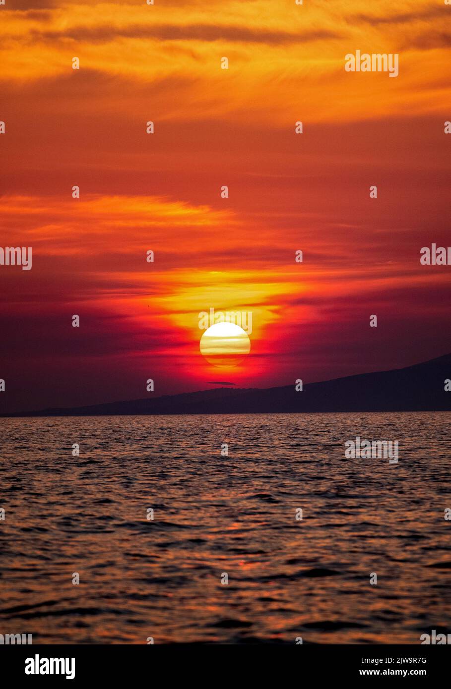Fantastic sunset in Crete Stock Photo - Alamy