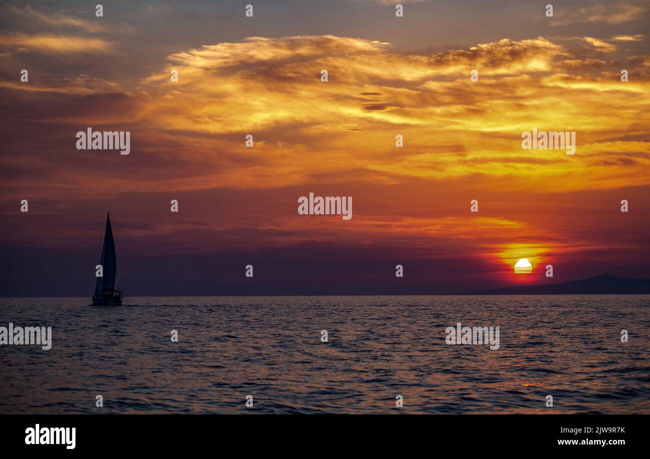 Fantastic sunset in Crete Stock Photo - Alamy